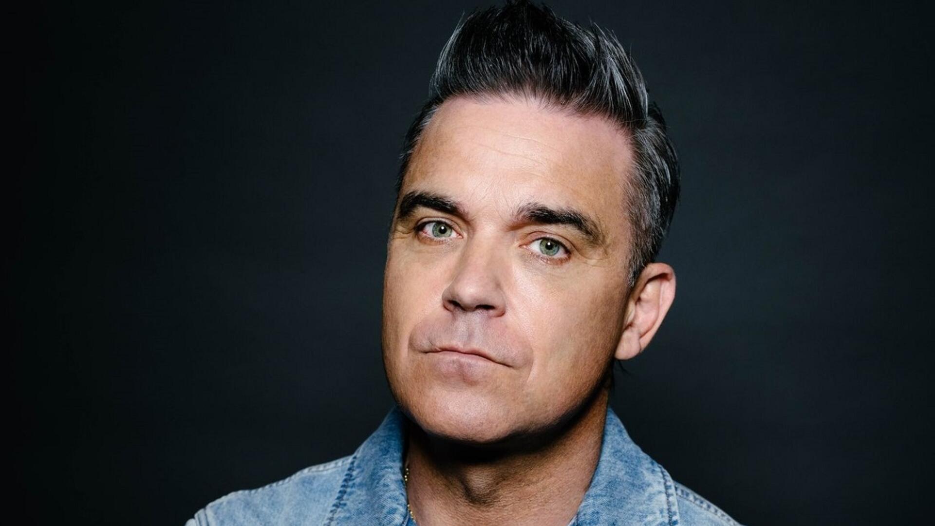 Robbie Williams rozlicza się z przeszłością w nowym teledysku do utworu ...